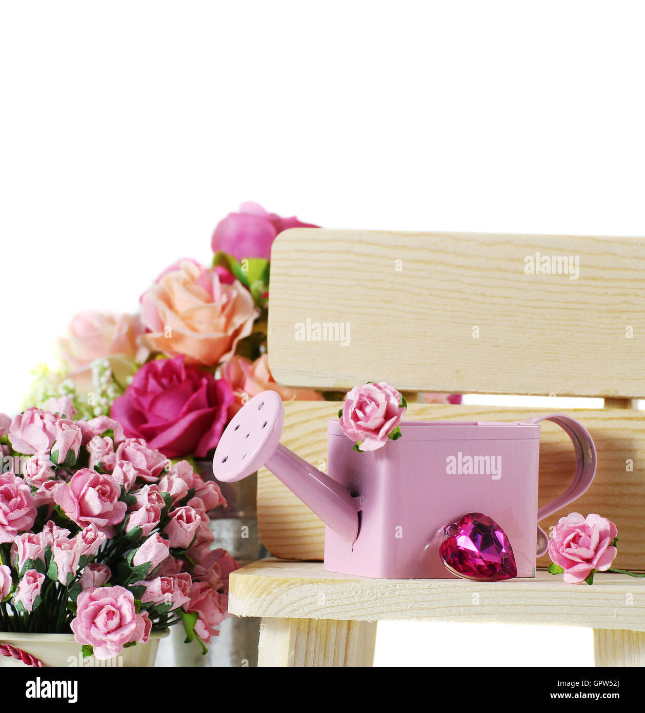 Watering can for wedding background Stock Photo - Alamy