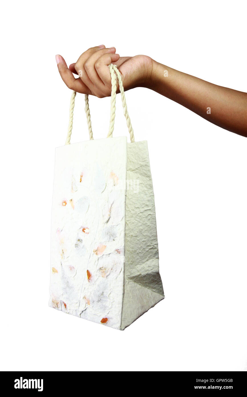 recycled paper craft paper bag in hand Stock Photo - Alamy