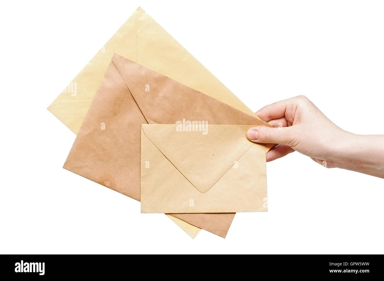 yellow envelopes in the hand isolated on white background Stock Photo ...
