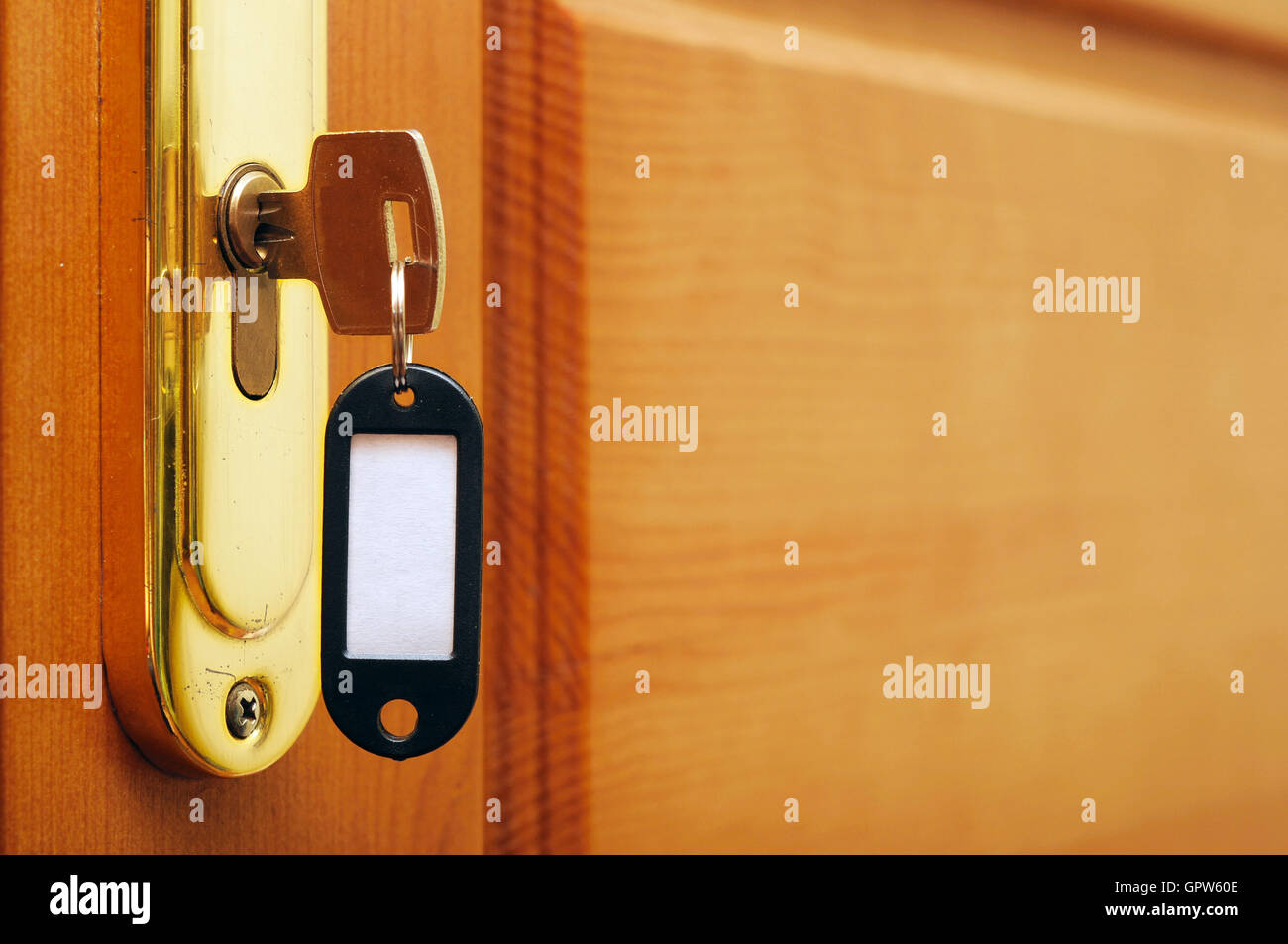 key in door lock Stock Photo - Alamy