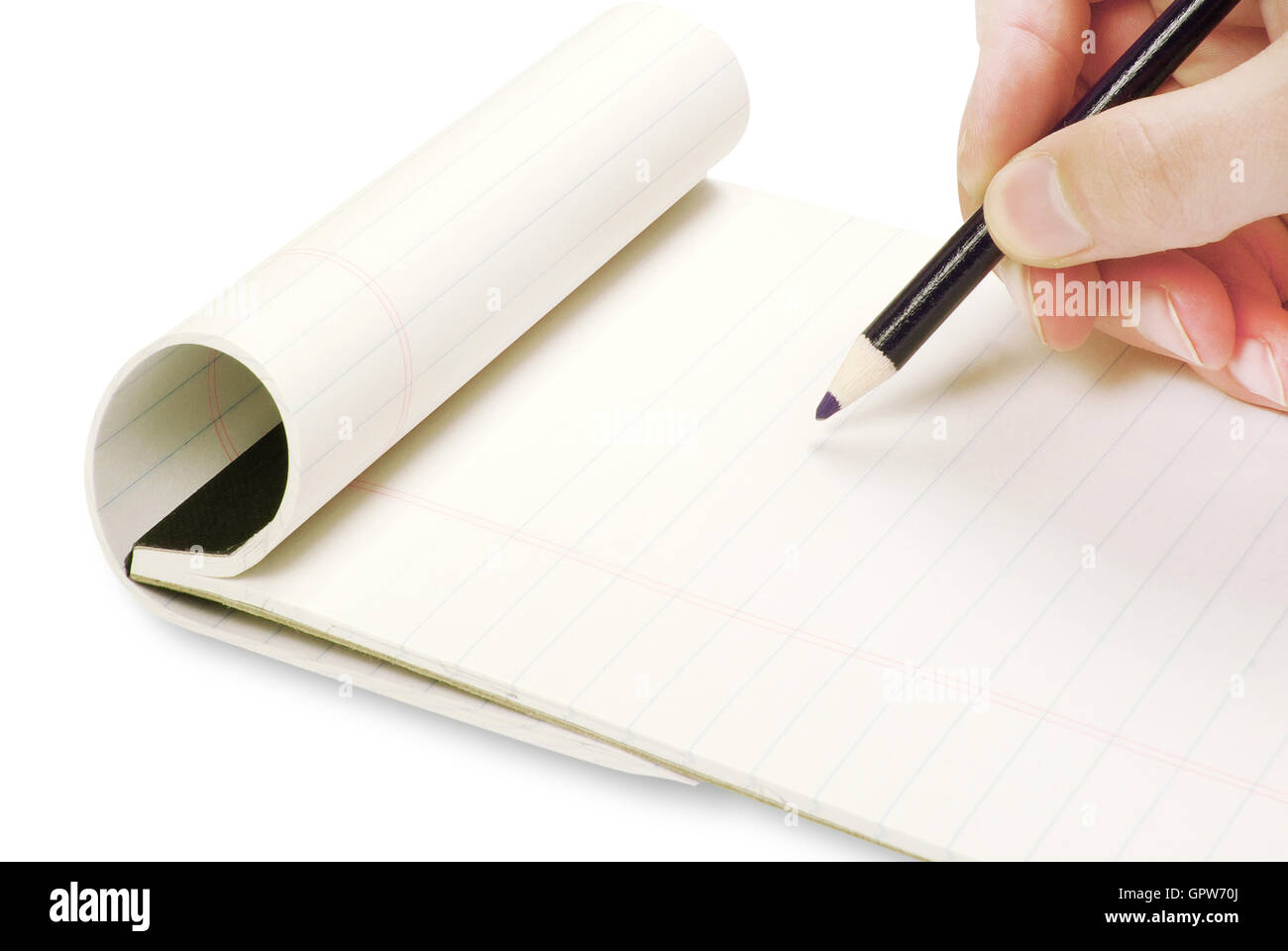 Pencil in hand writing on the notebook Stock Photo - Alamy