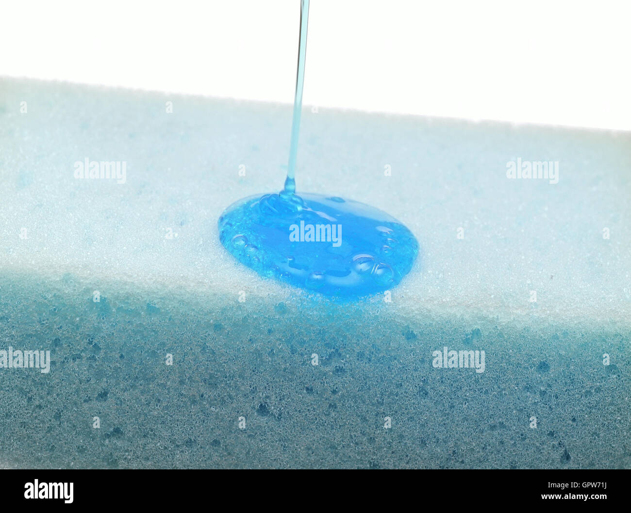 closeup sponge and soap gel, isolated on white Stock Photo - Alamy