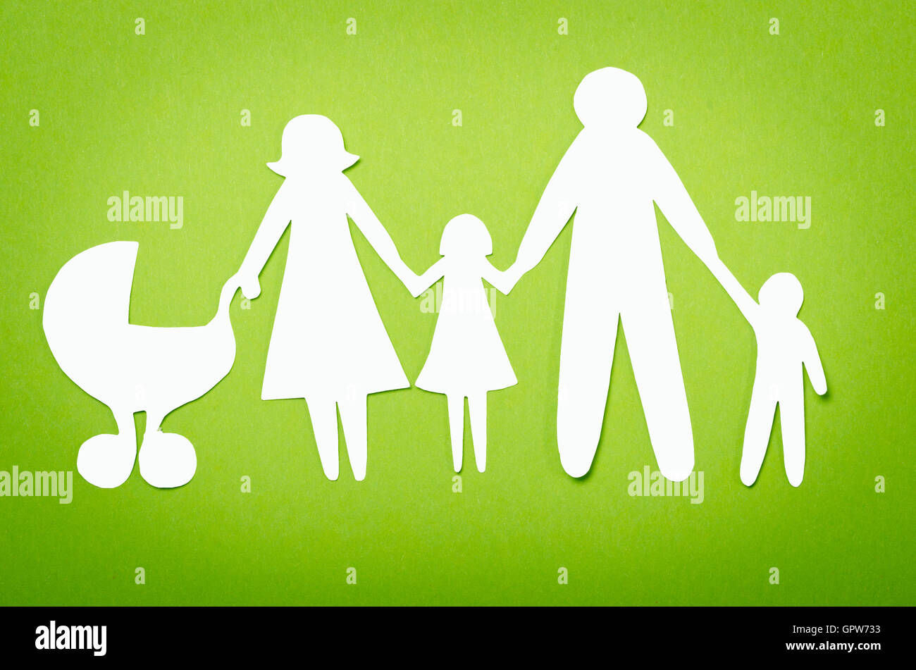Closeup of paper family on white background Stock Photo - Alamy