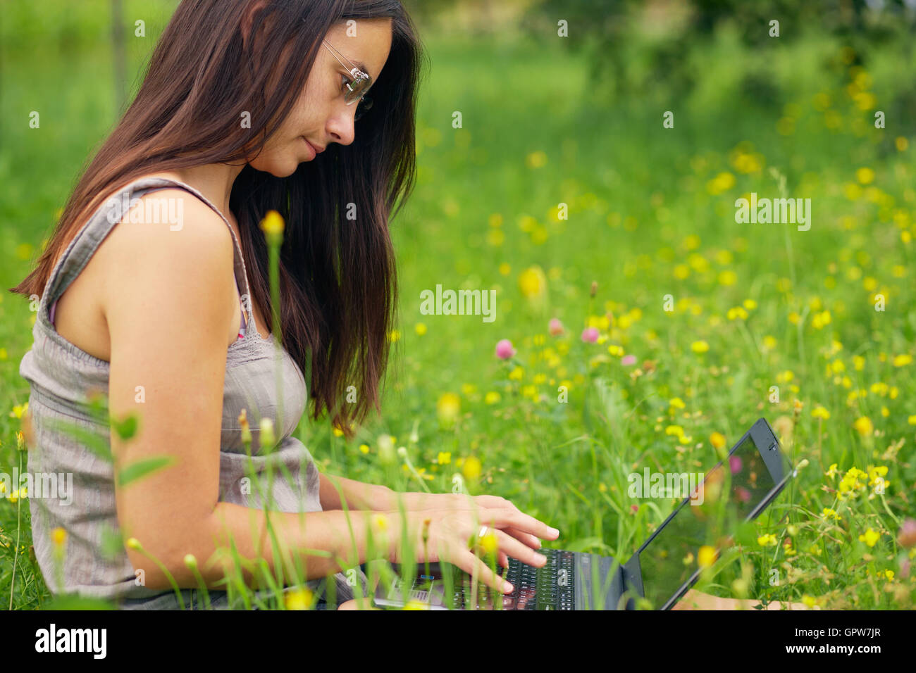 Young woman with his computer Stock Photo - Alamy