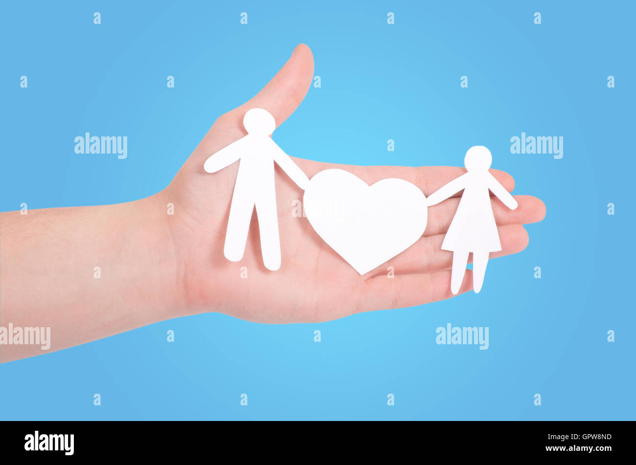 paper family in hands Stock Photo - Alamy
