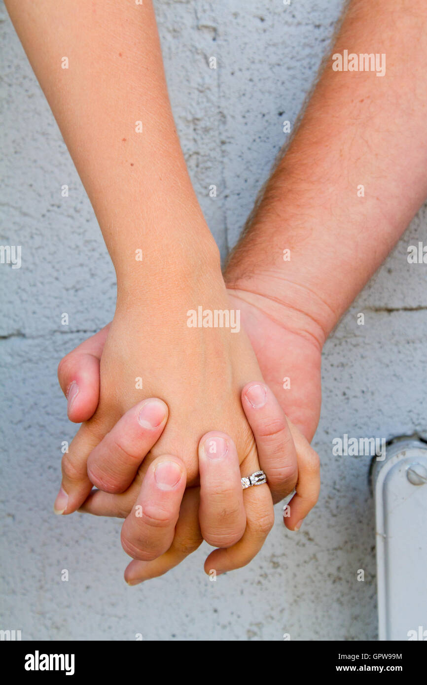 Interlocking hands hi-res stock photography and images - Alamy