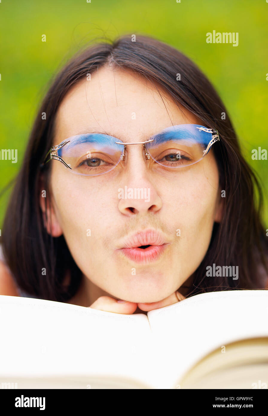 Woman with a book Stock Photo - Alamy