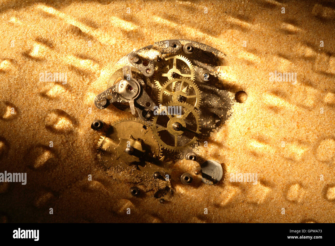 Gears In Sand Stock Photo - Alamy
