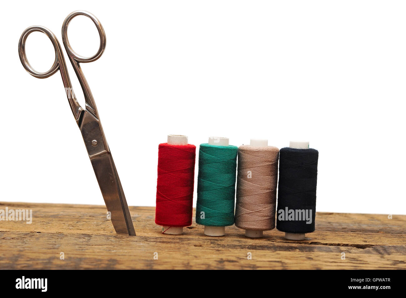 tools for needlework colorful threads and scissors on wooden bac Stock ...