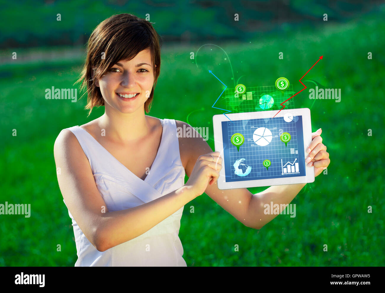 Young woman looking at modern tablet with abstract light and var Stock ...