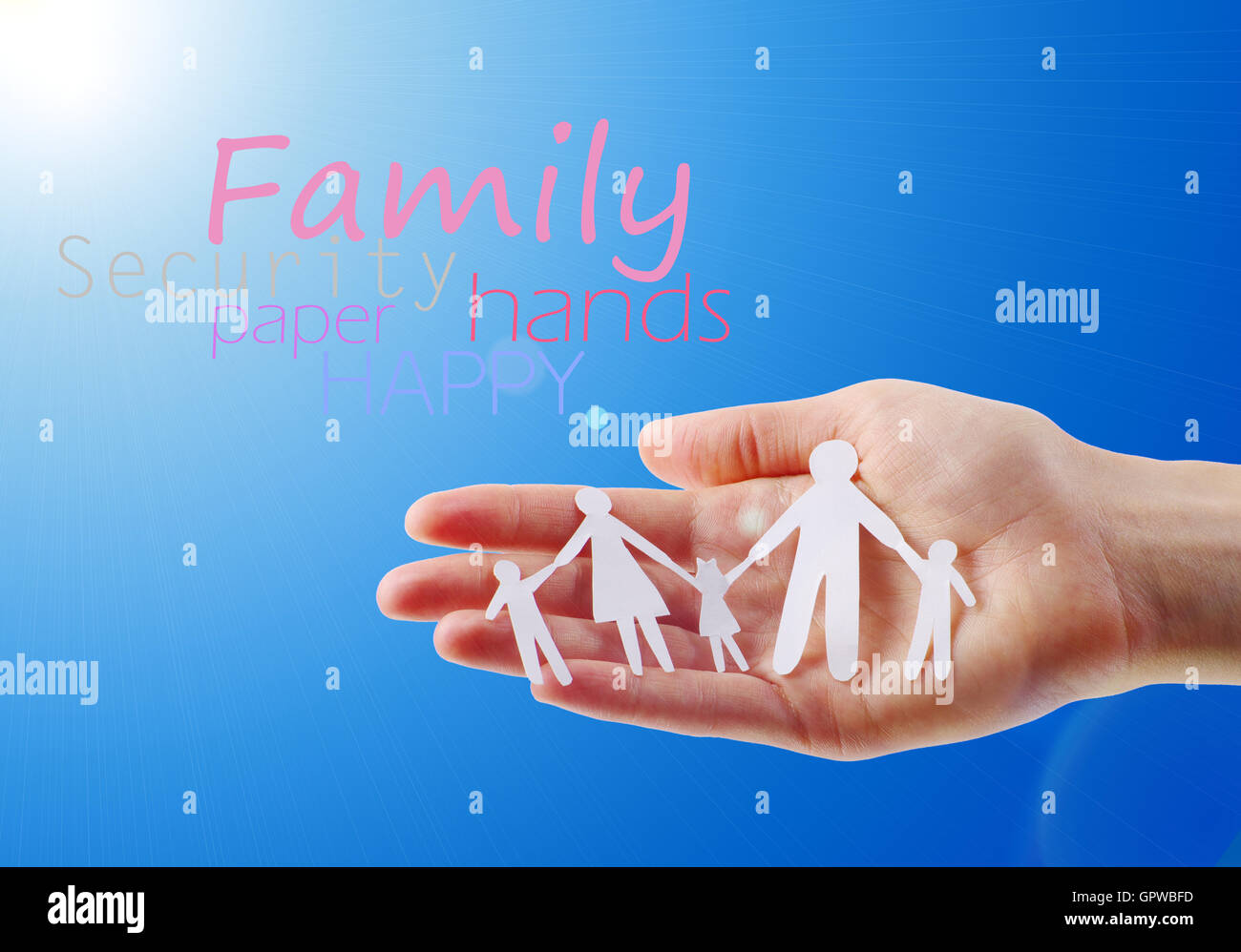 Paper family in hands Stock Photo - Alamy