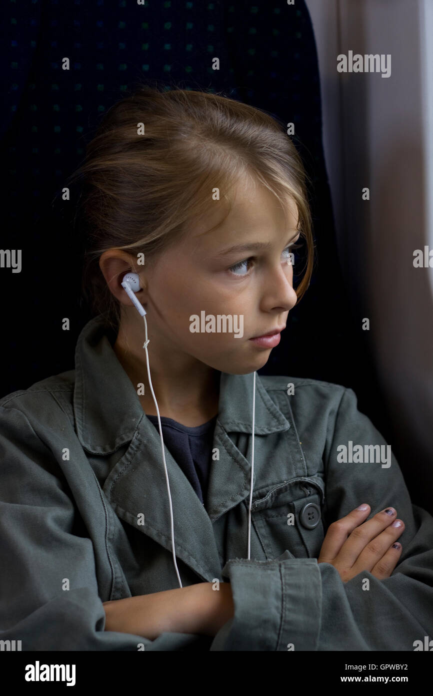 Young girl onboard a train Stock Photo - Alamy