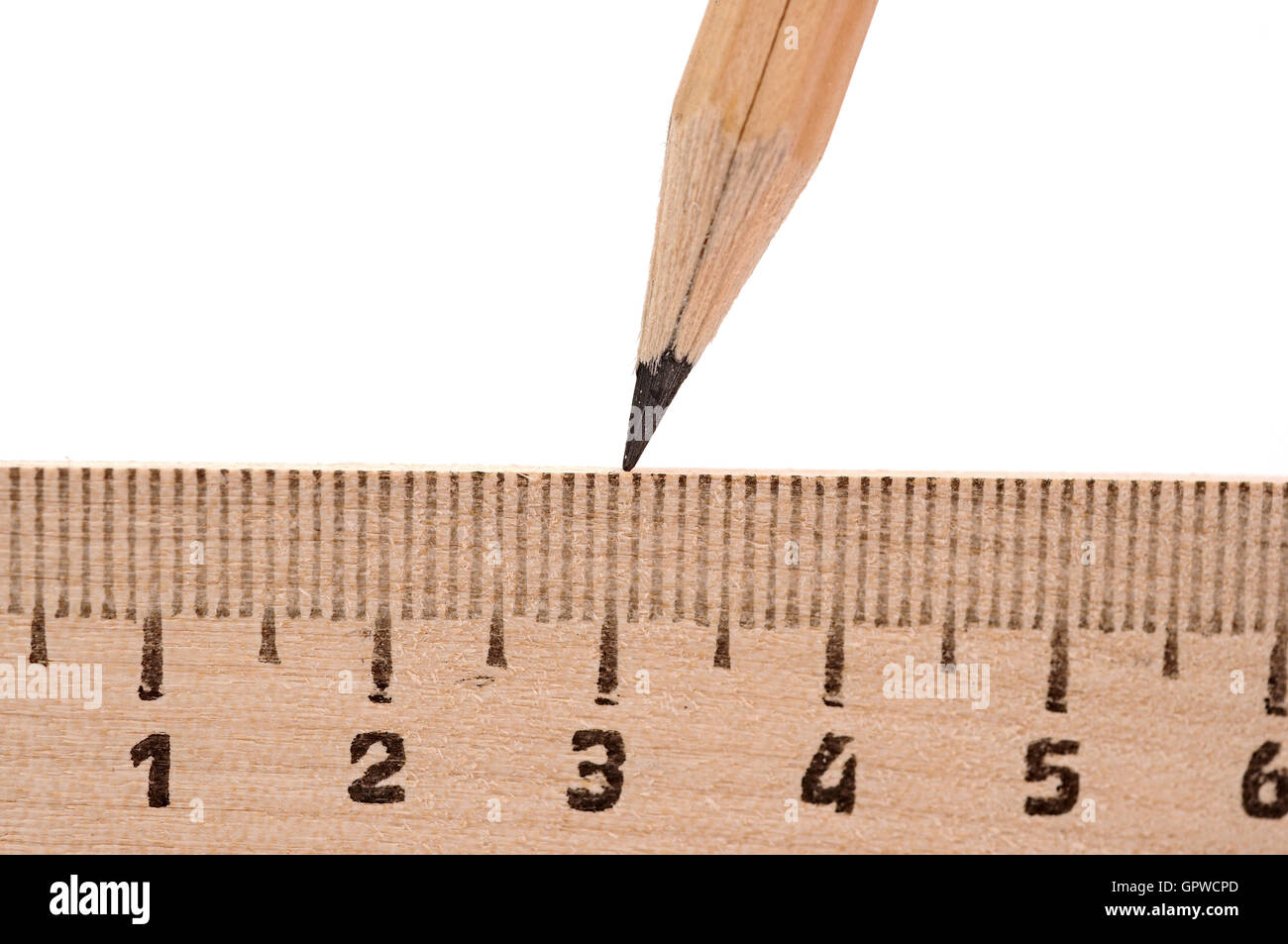 ruler and wood pencil on white Stock Photo - Alamy