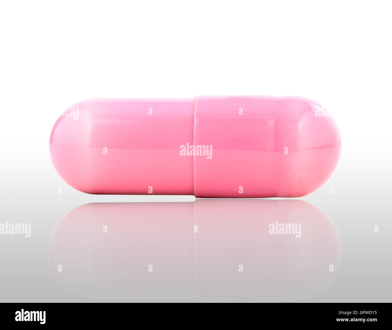Pink herbal capsule hi-res stock photography and images - Alamy