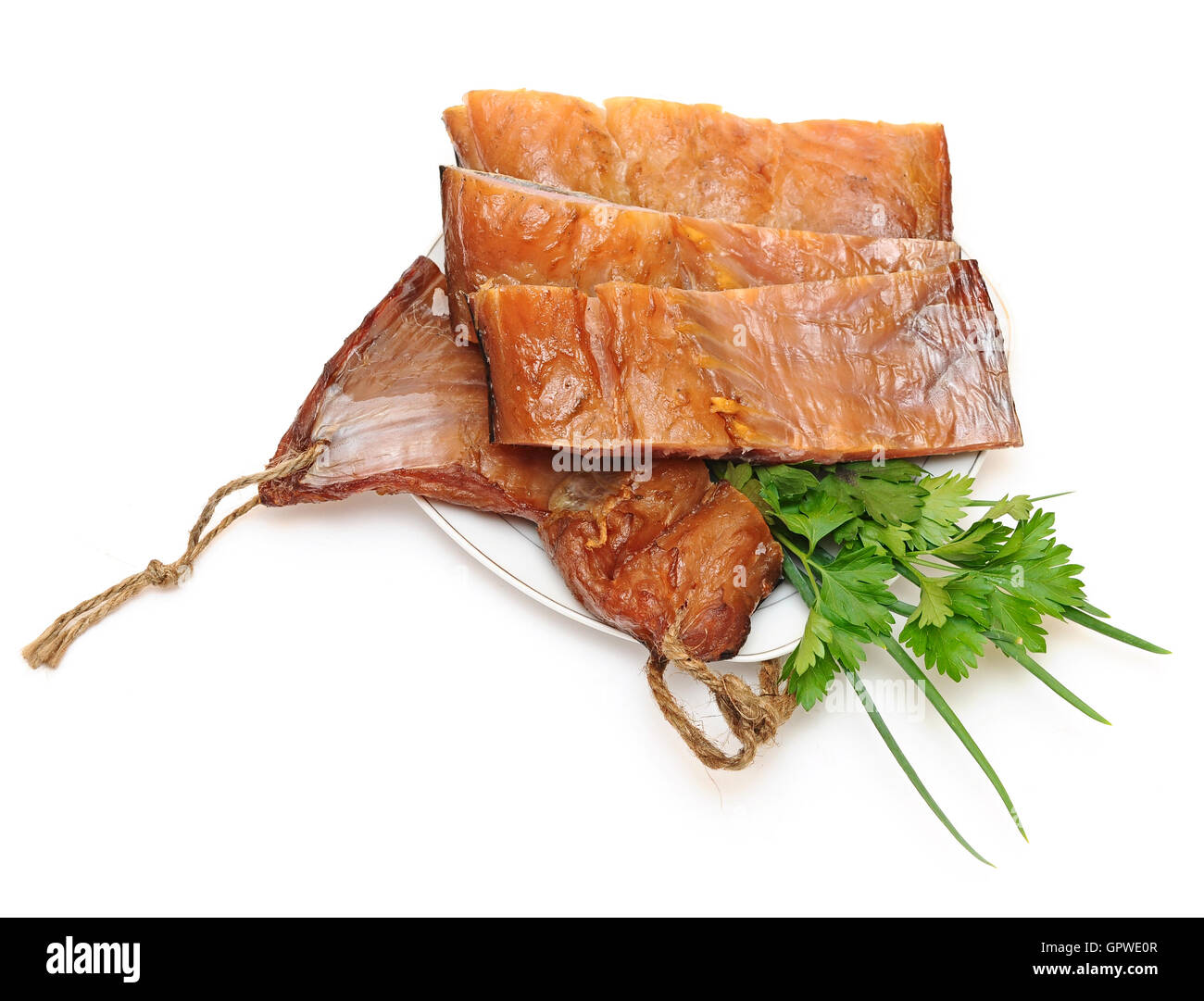 fillet smoked fish on a white background Stock Photo - Alamy