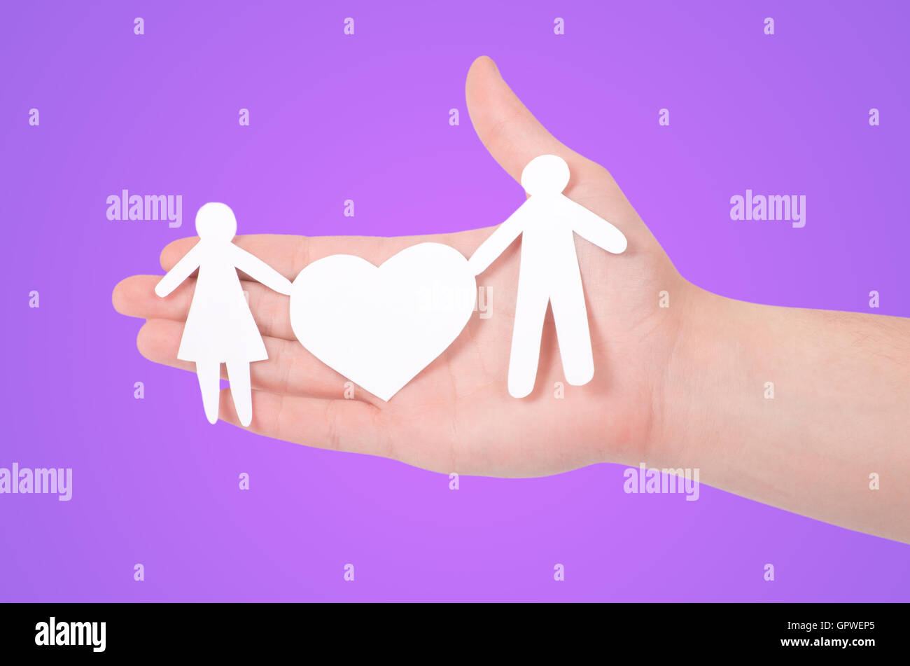 paper family in hands Stock Photo - Alamy