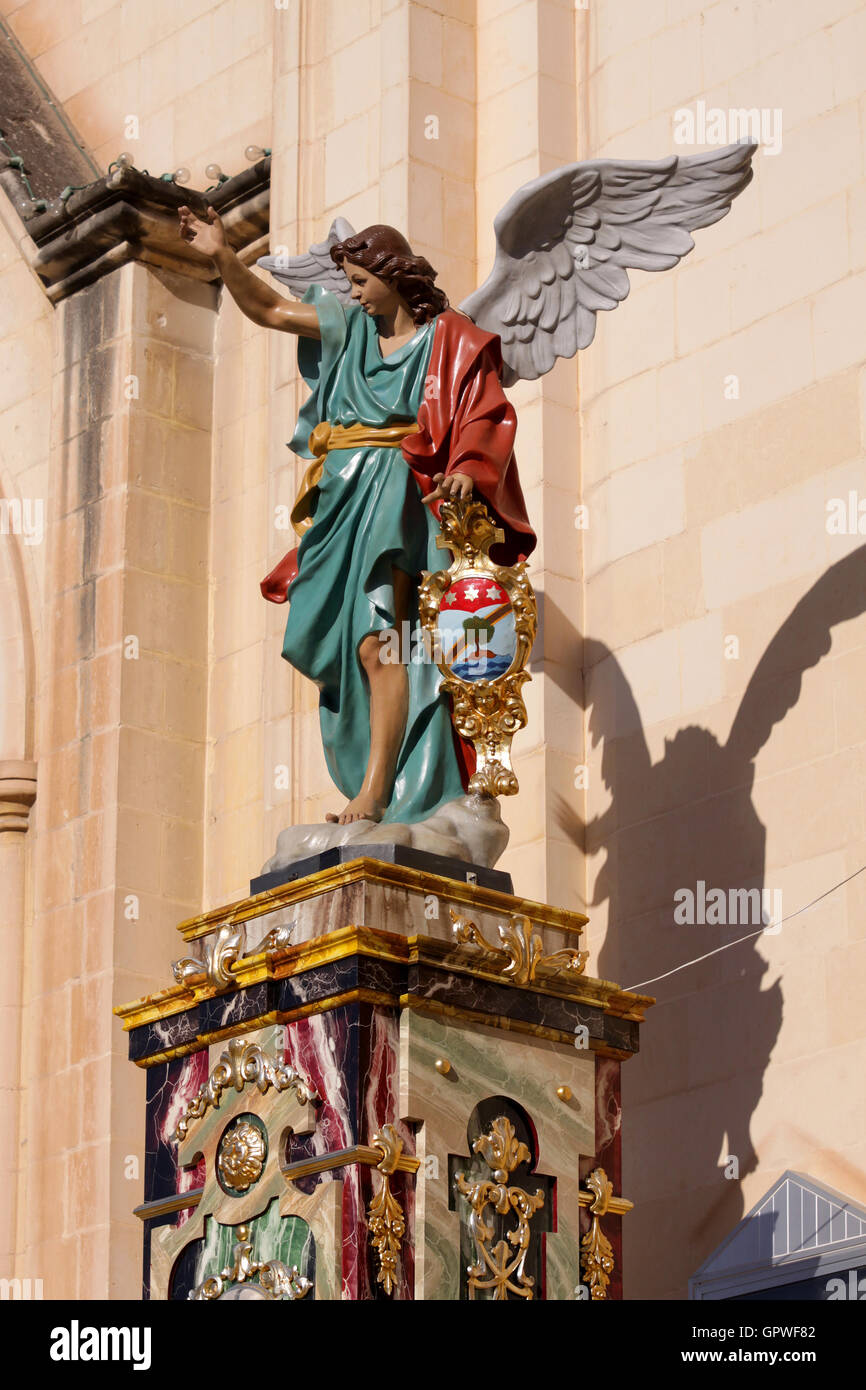 Angel outside a church Stock Photo - Alamy