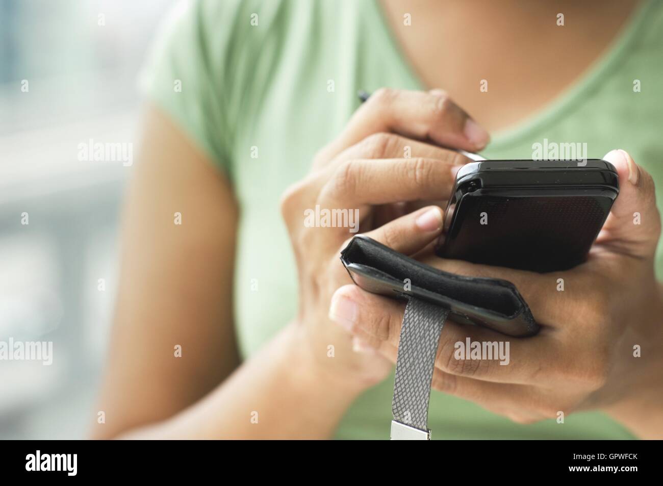 Hand asian girl using texting hi-res stock photography and images - Alamy