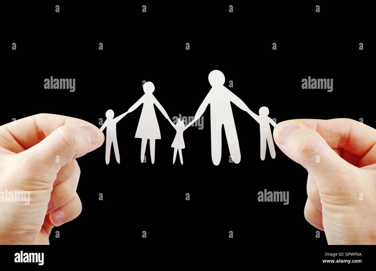 paper family in hands Stock Photo - Alamy