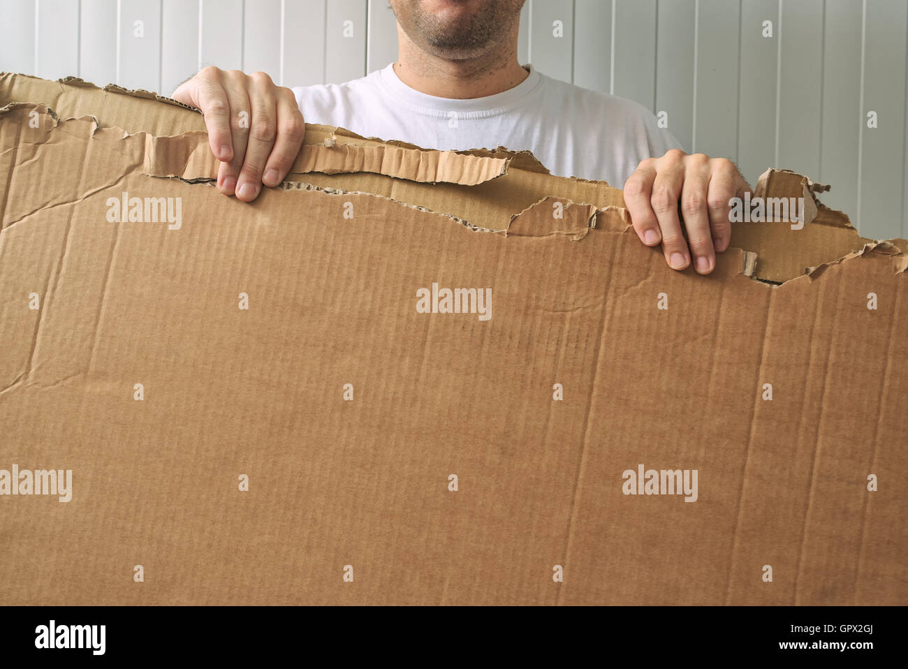 Man holding blank cardboard as copy space for your message Stock Photo ...