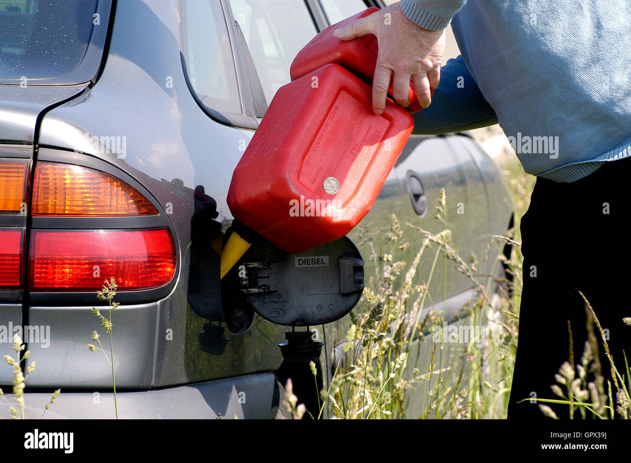 Running out on a country road Stock Photo - Alamy