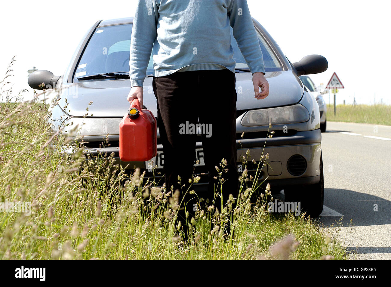 Running out on a country road Stock Photo - Alamy