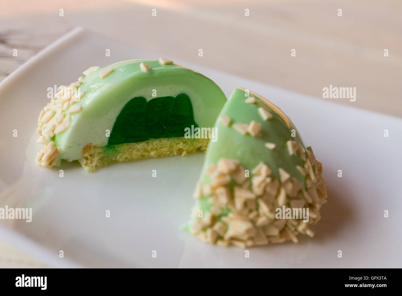 Small dessert with filling Stock Photo - Alamy