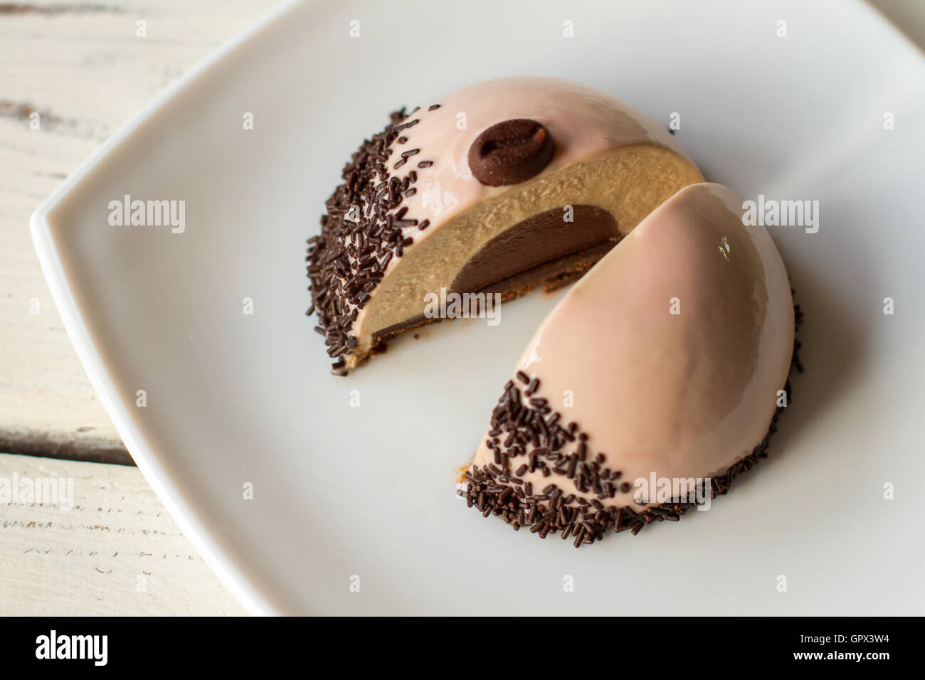 Small cake with filling Stock Photo - Alamy