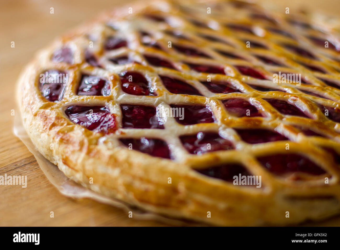 Pie with red filling Stock Photo - Alamy