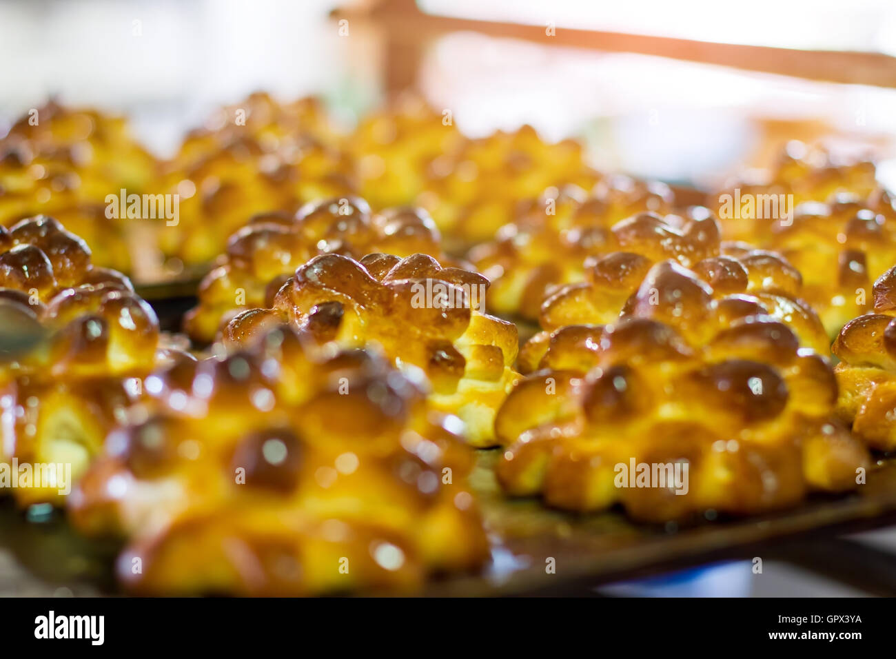 Cooked pastry on a tray Stock Photo - Alamy
