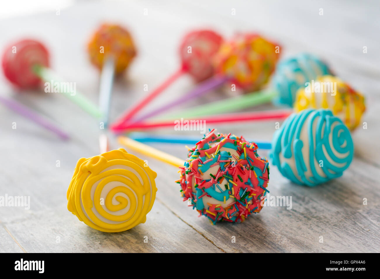 Bright-colored cake pops Stock Photo - Alamy
