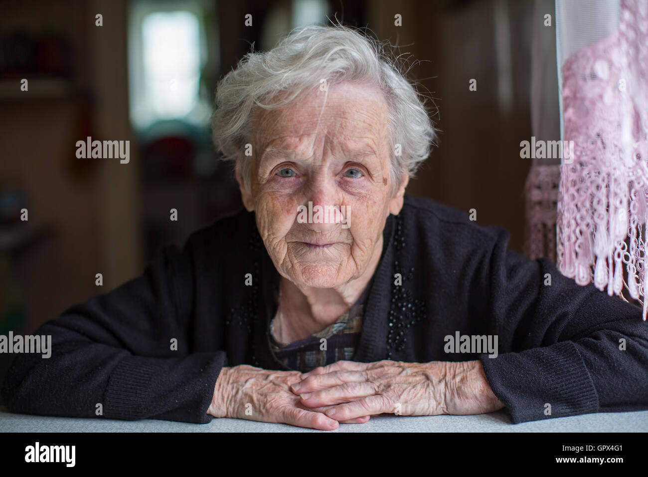 Portrait of female retirement age. An elderly woman Stock Photo - Alamy