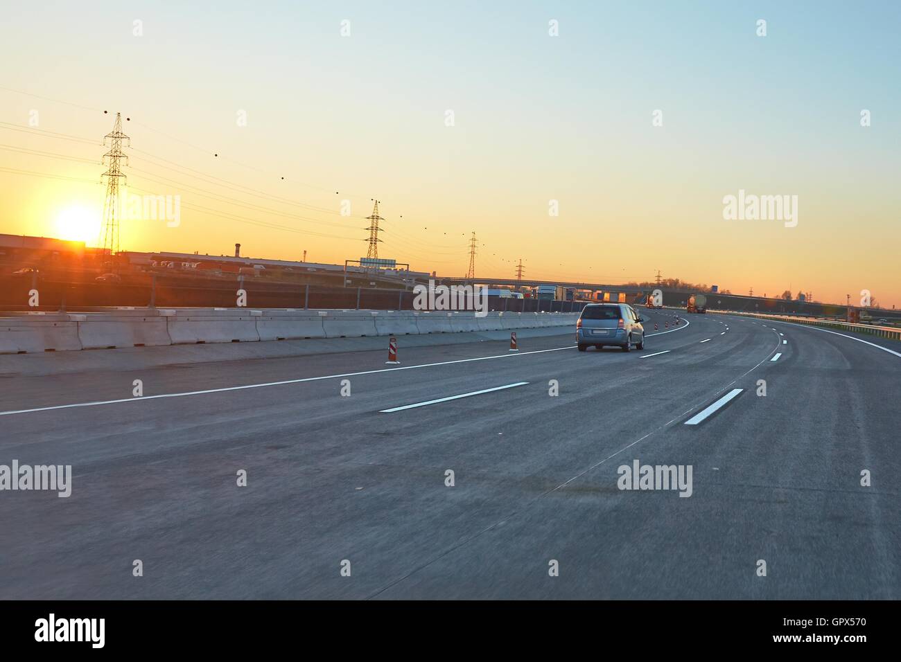 Car driving on empty motorway hi-res stock photography and images - Alamy