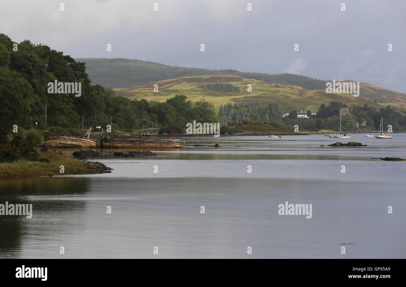 Derelict boats and ruin of Aros castle near Salen Isle of Mull Scotland ...