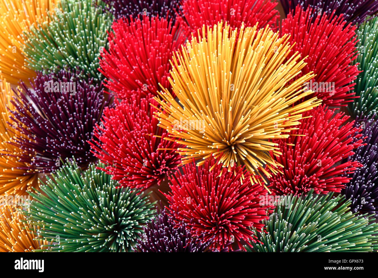 Colored incense sticks Stock Photo - Alamy