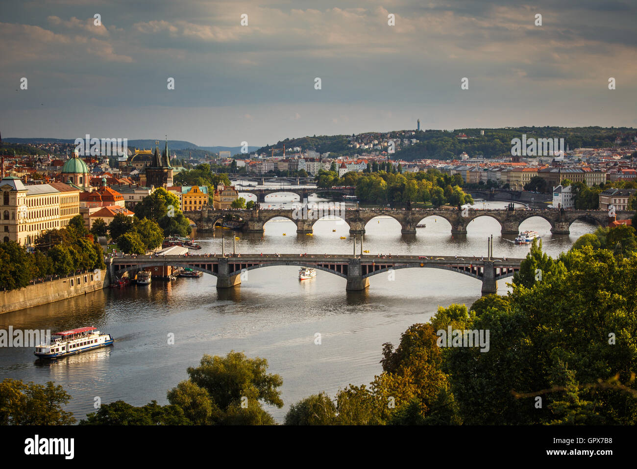 Prague with its splendid bridges over the Vltava river, city sunset panorama, Czech Republic ...