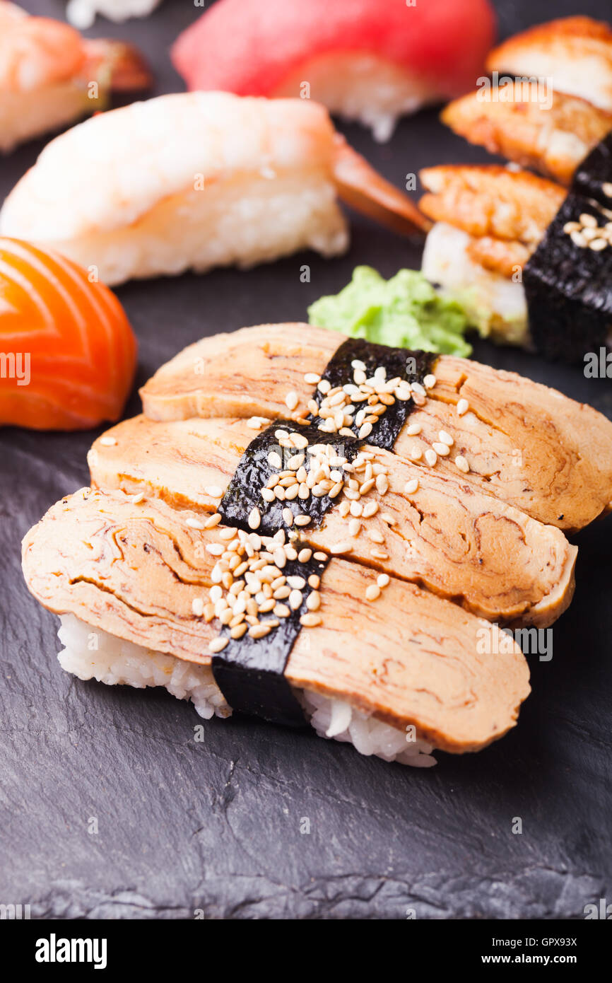 Tamago sushi with omelet Stock Photo - Alamy