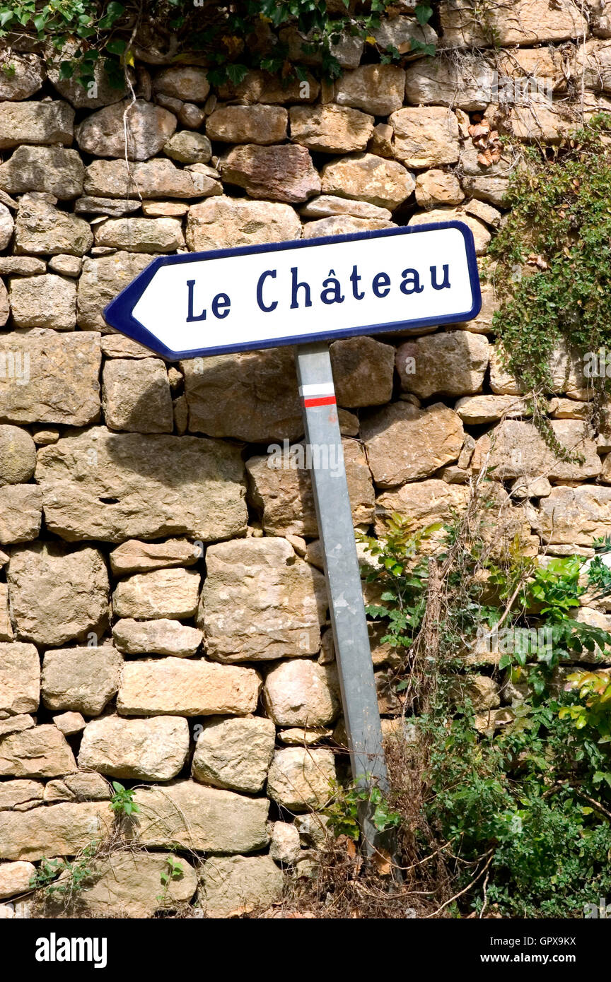 panel in the medieval village of Castelnaud indicating the direction to ...