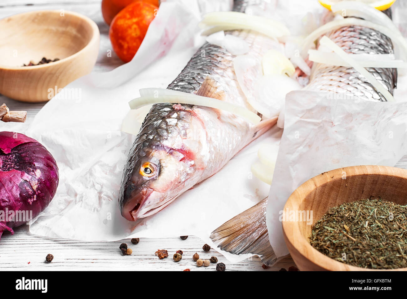 Freshly caught fish and spices cooking cooking Stock Photo - Alamy