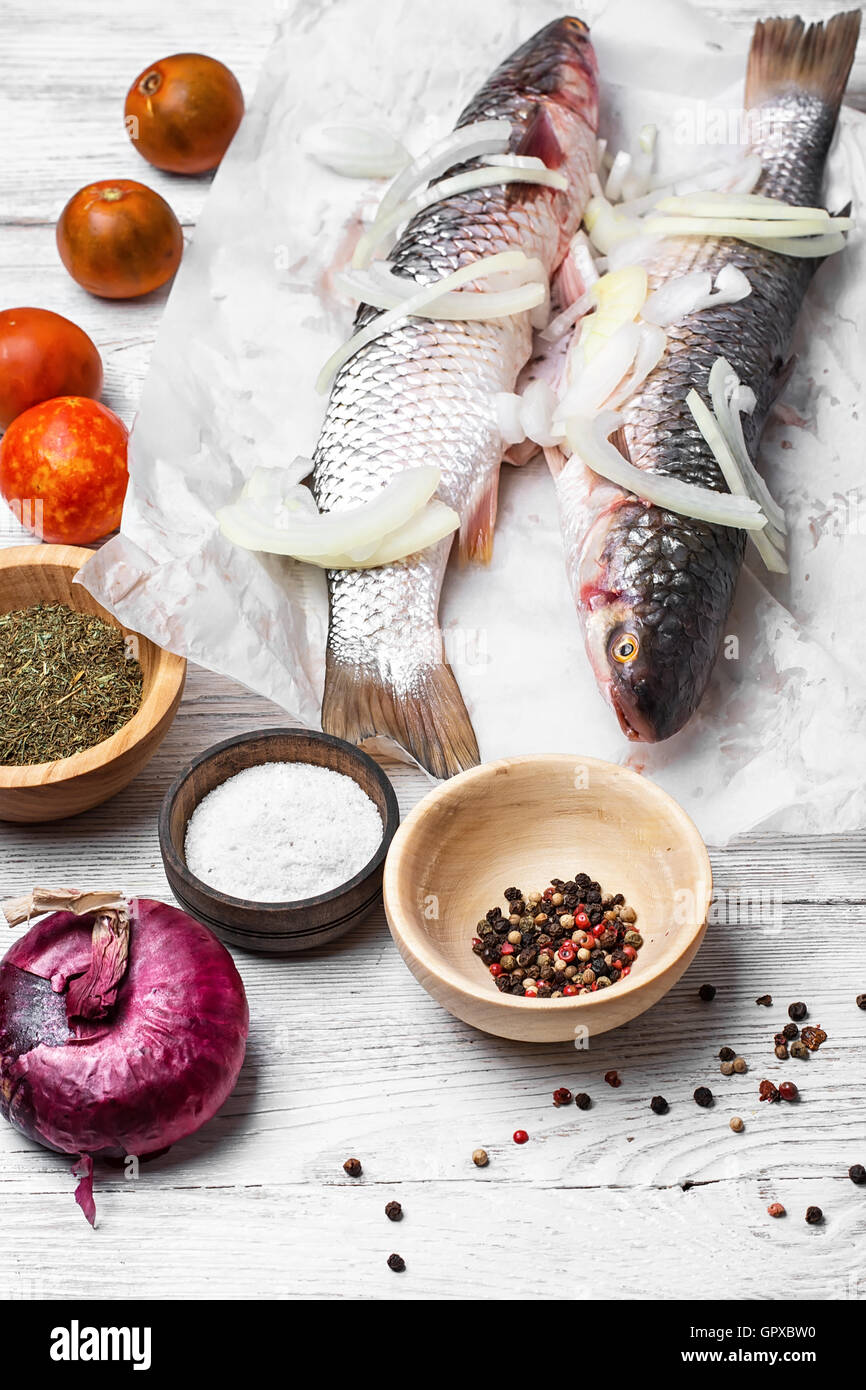 Freshly caught fish and spices cooking cooking Stock Photo - Alamy