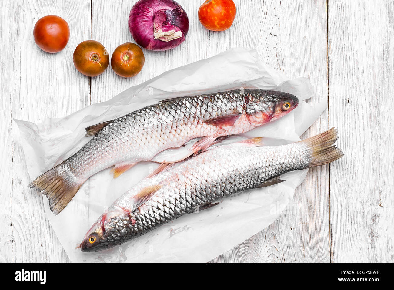 Freshly caught fish and spices cooking cooking Stock Photo - Alamy