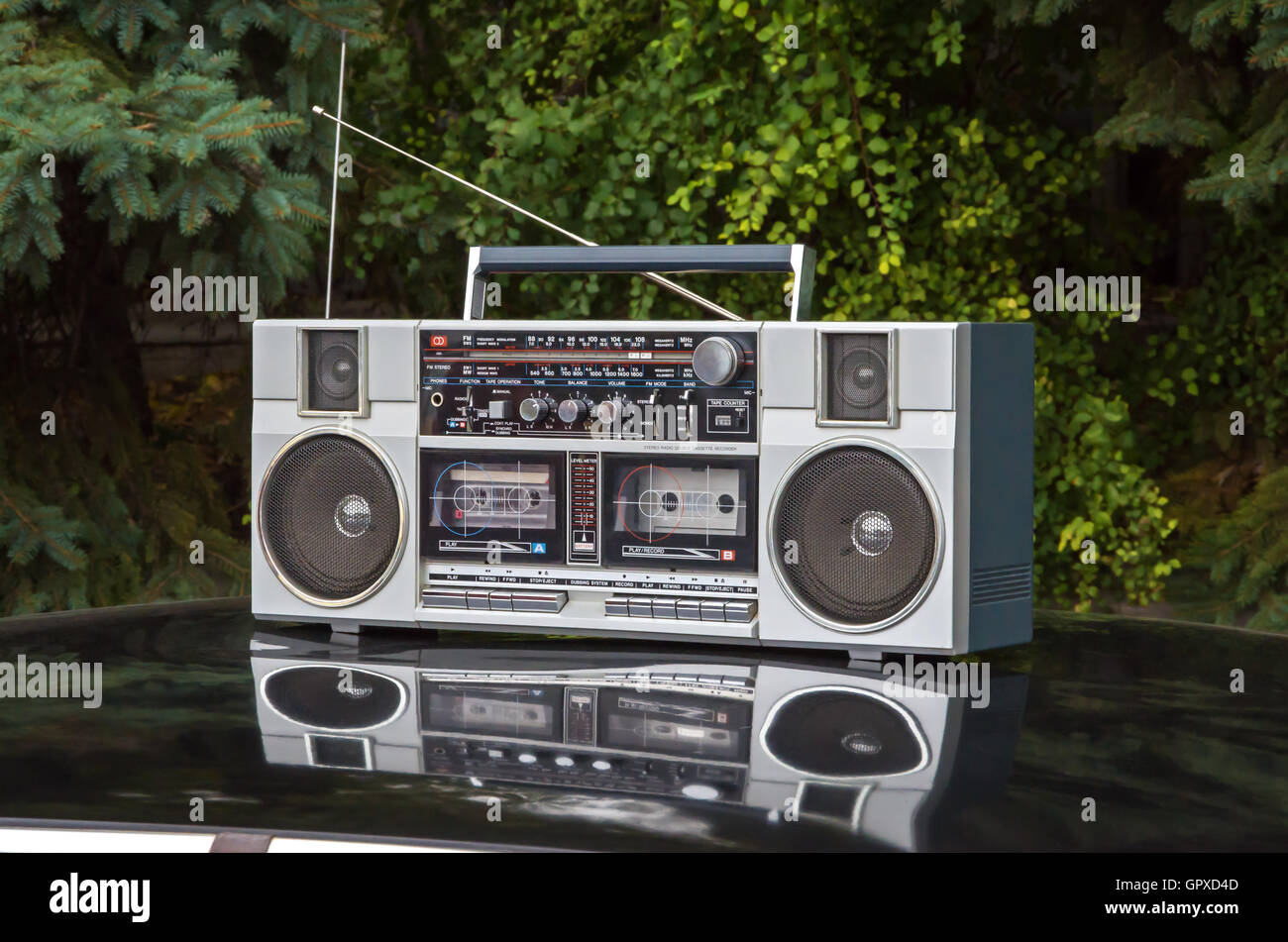 Device for sound playback and recording is on the roof of a retro car ...