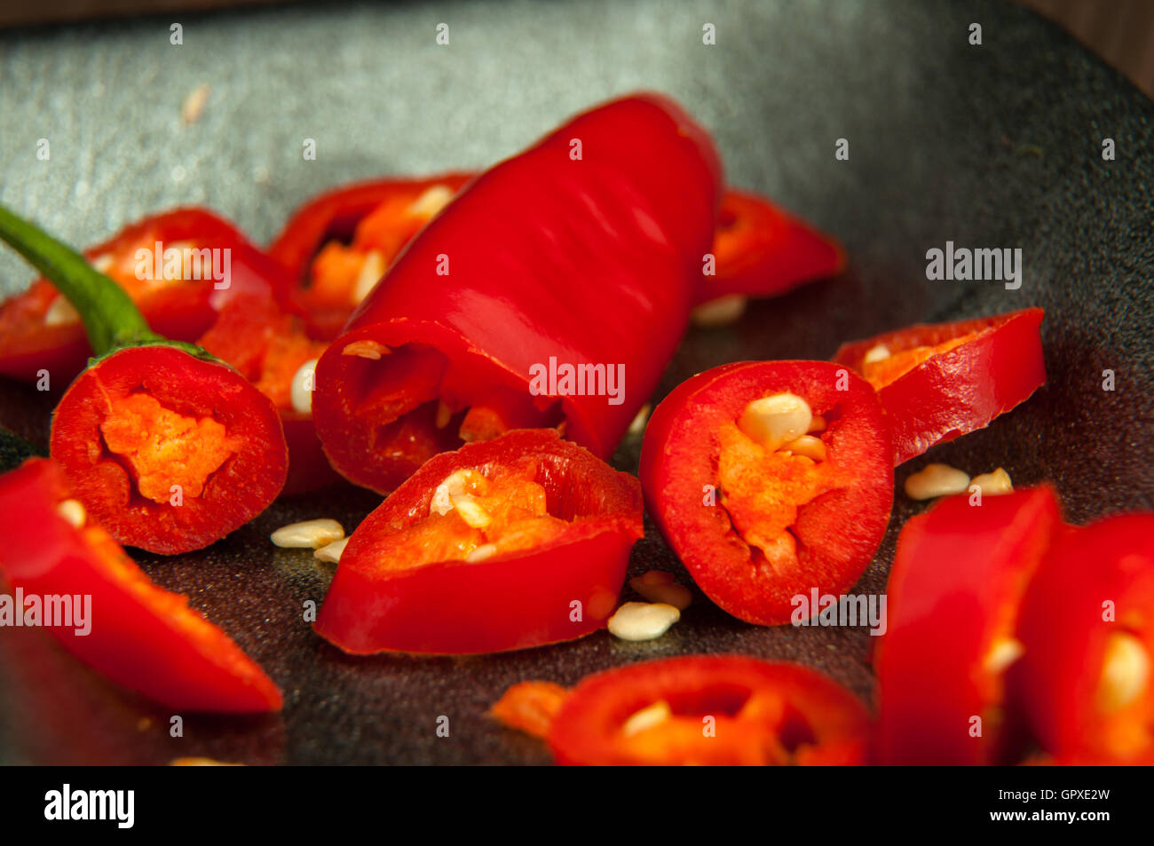 Slice chilli pepper Stock Photo - Alamy