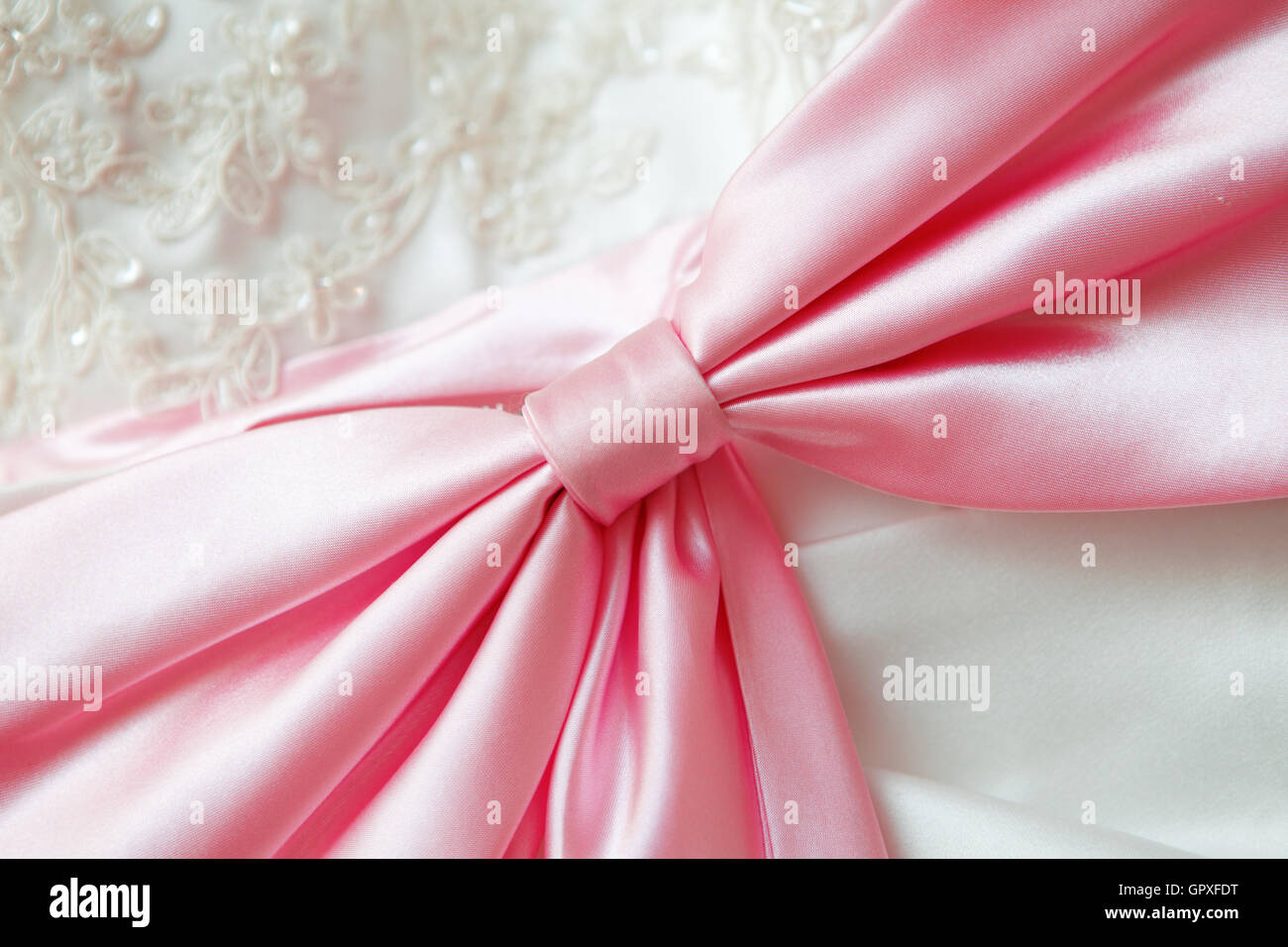 Pink bow dress gown hi-res stock photography and images - Alamy