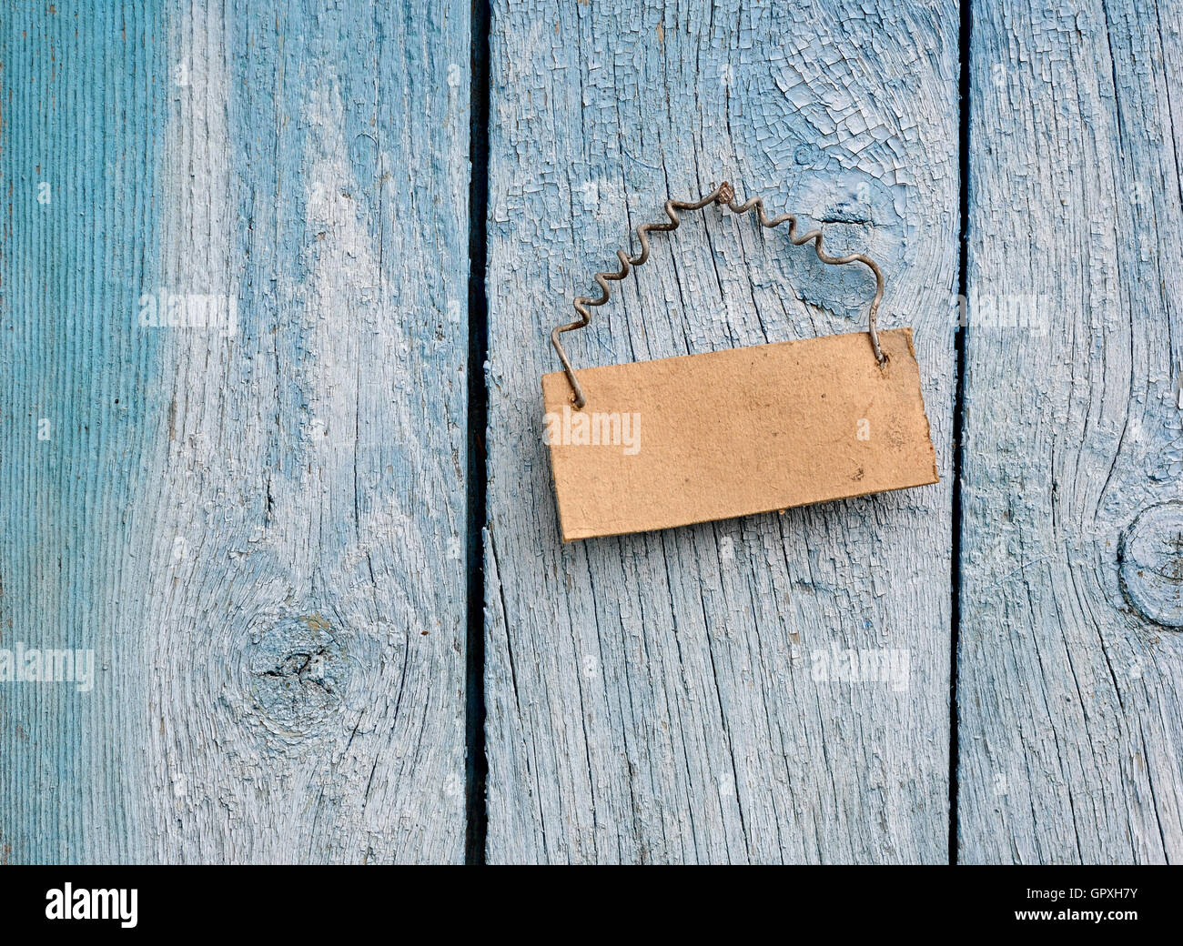 wooden board hanging on the wall Stock Photo - Alamy