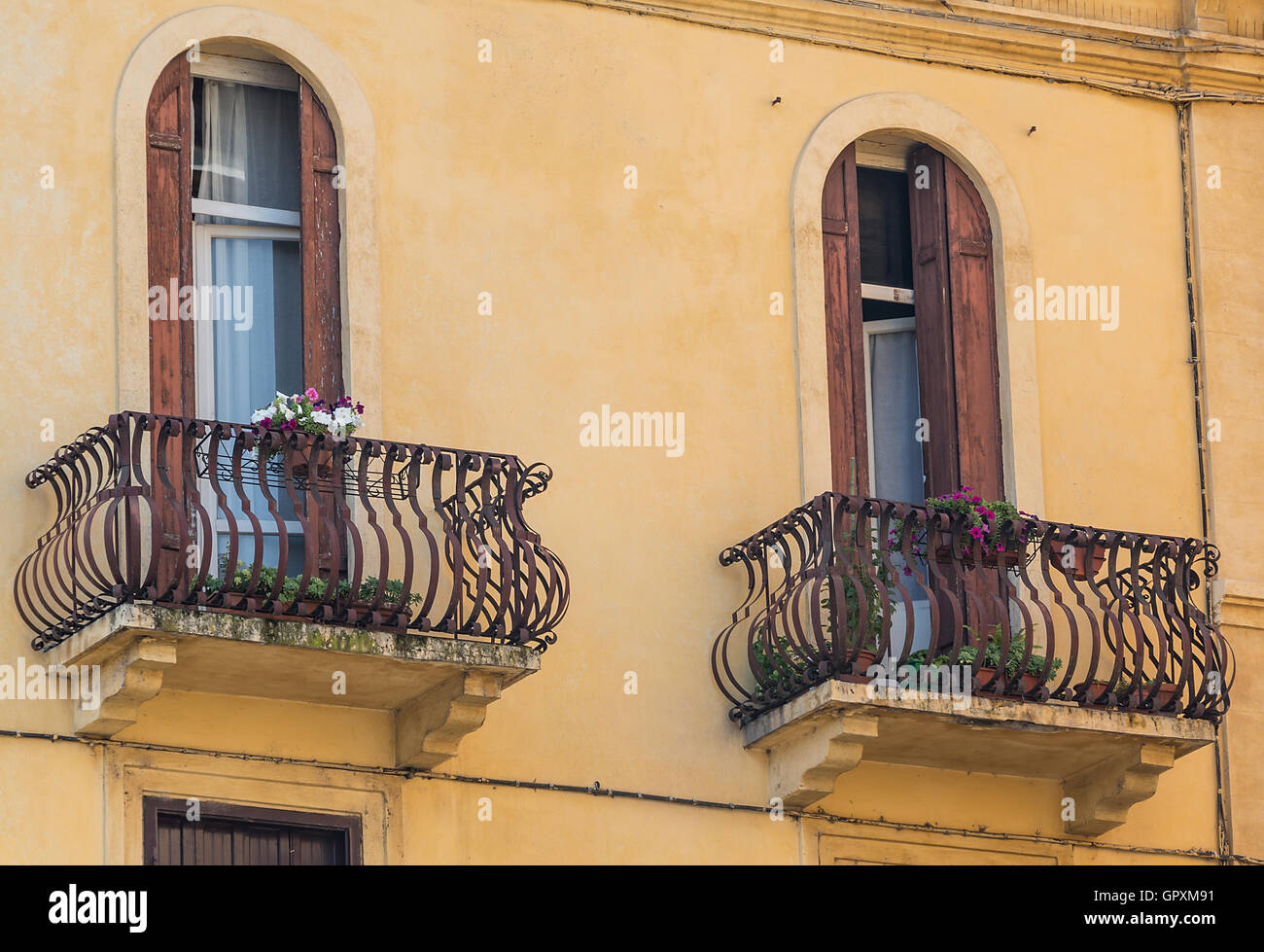 old windows in the house with flowers Stock Photo - Alamy