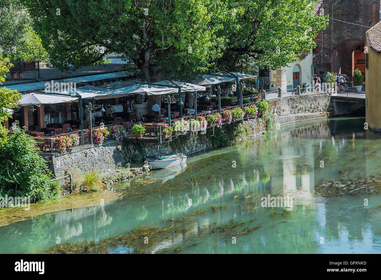 ancient restaurant of a typical Italian medieval village and water: the ...