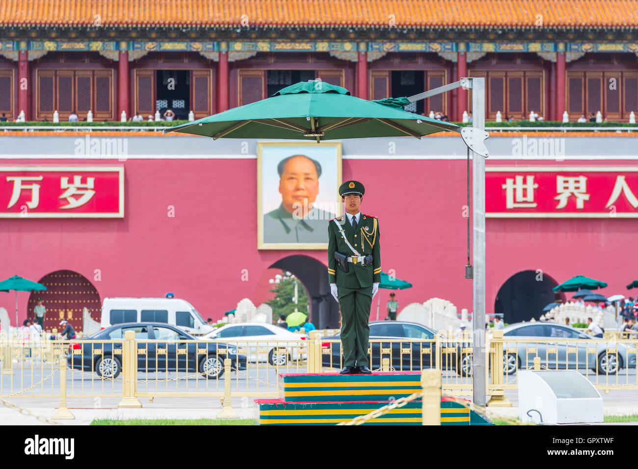 An unidentified soldier stands guard at Tiananmen Square, one of the ...