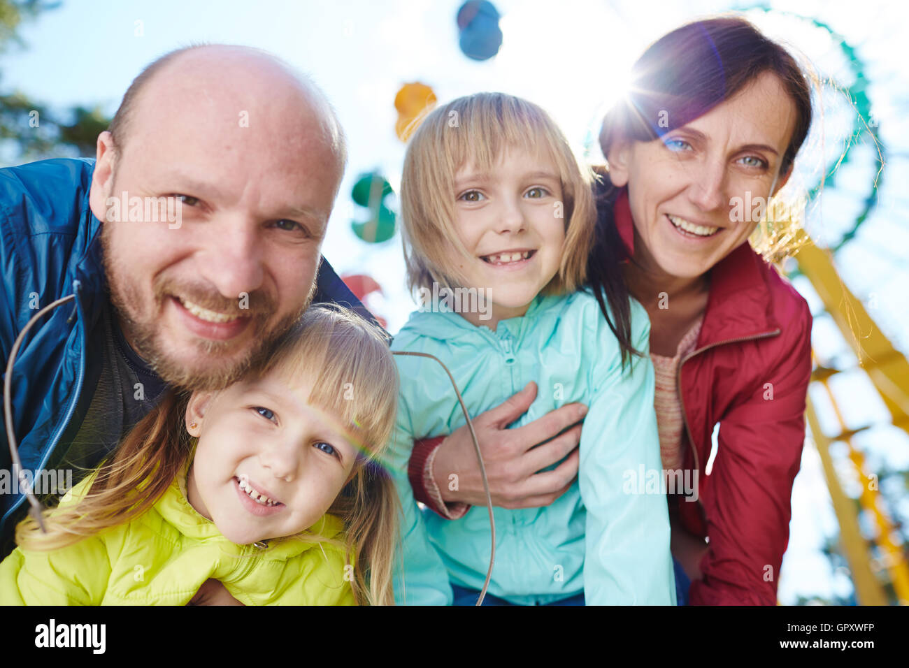 Weekend with Kids in Amusement Park Stock Photo - Alamy