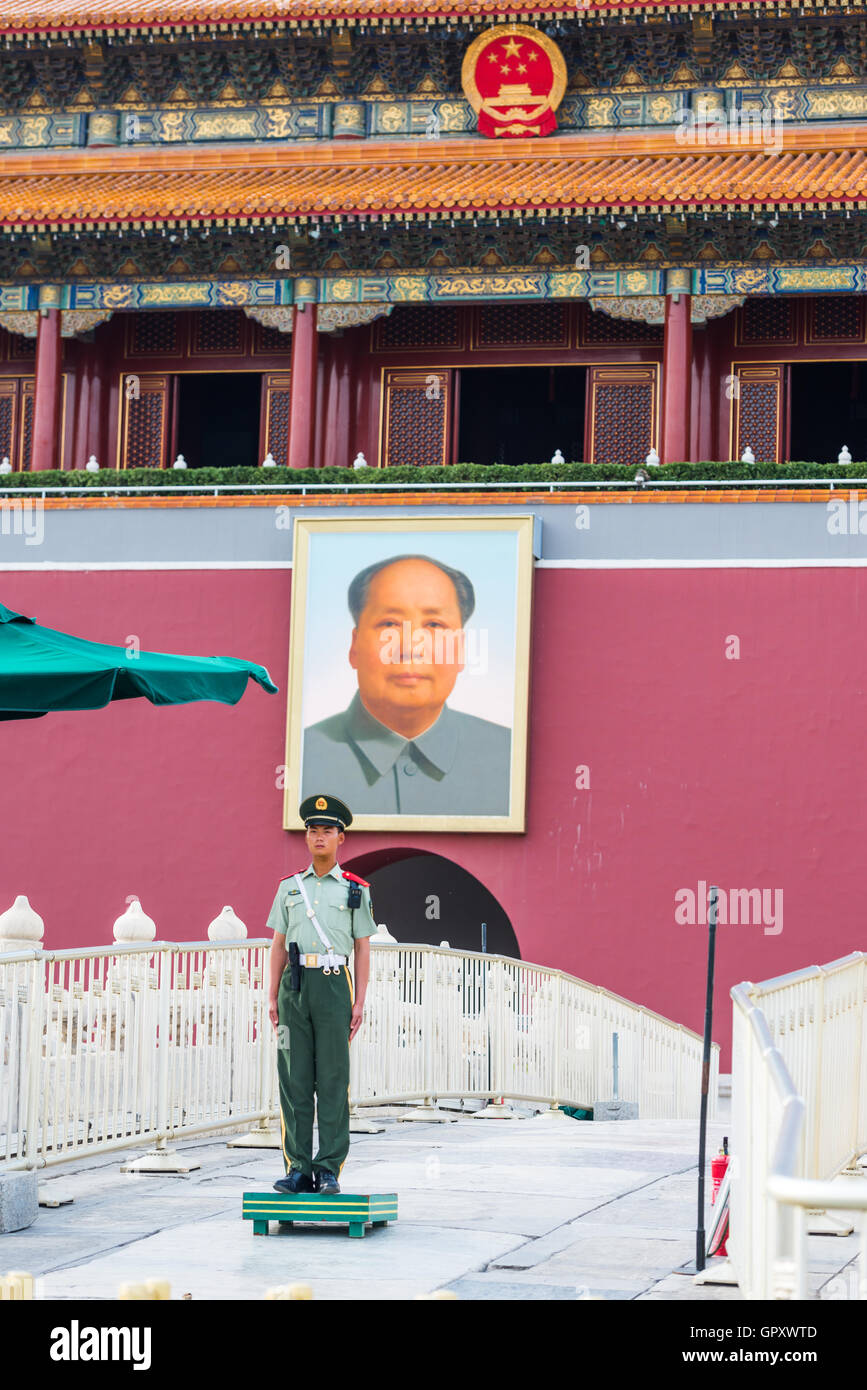 An unidentified soldier stands guard at Tiananmen Square, one of the ...